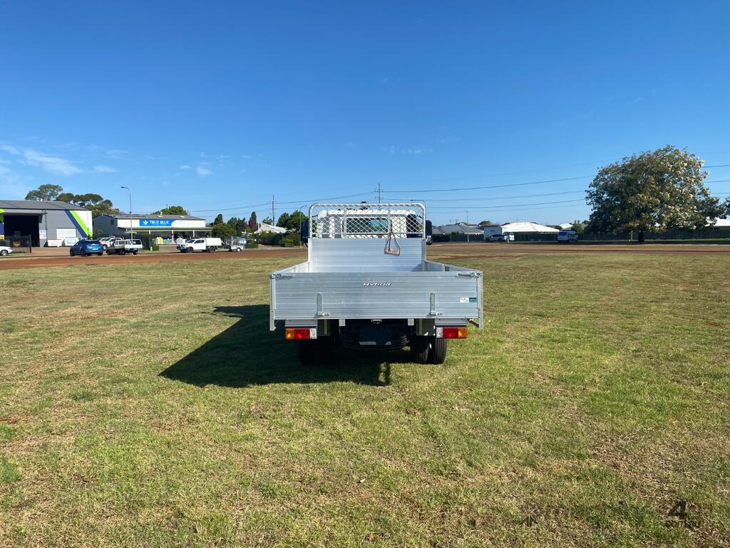 Buy New 2023 Hino 2023 Hino Hybrid 616 AMT 3430 Wide Hybrid Tray Dropside Tray Truck (1076875)