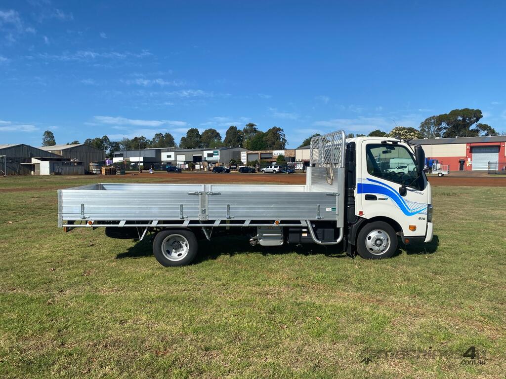 Buy New 2023 Hino 2023 Hino Hybrid 616 AMT 3430 Wide Hybrid Tray Dropside Tray Truck (1076875)