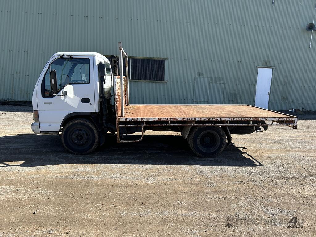 Buy Used 1998 Isuzu 1998 Isuzu NPR250 N8 4x2 Tray Truck Trucks in , - Listed on Machines4u