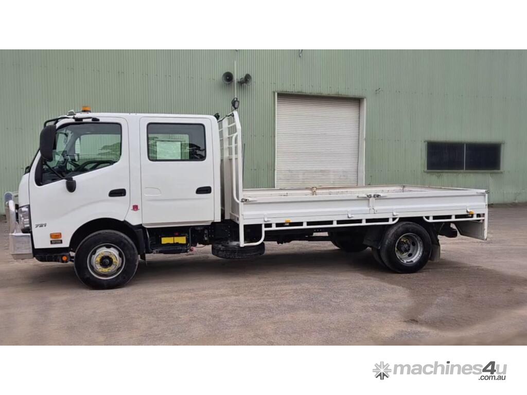 Buy Used Hino 2022 Hino 300 Series 2 Crew Cab Wide Tray Truck Trucks (1114790) - Listed on ...
