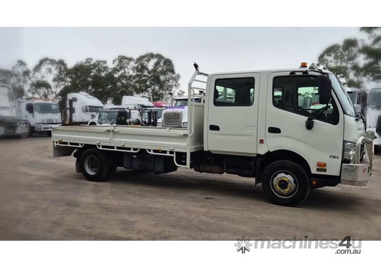 Buy Used Hino 2022 Hino 300 Series 2 Crew Cab Wide Tray Truck Trucks (1114790) - Listed on ...